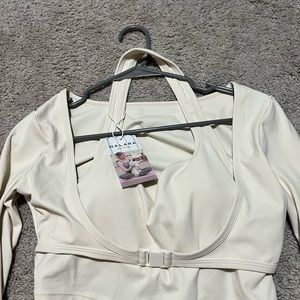 HALARA | Tops | Halara Nwt Fabric Halter Thumb Hole Long Sleeve Cropped ...